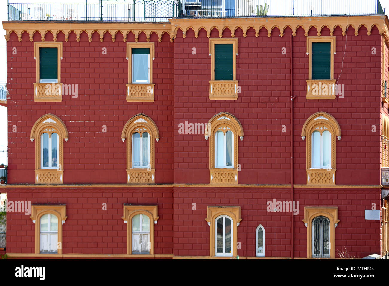 Traditional Style Building With Arch Windows in Naples Stock Photo - Alamy
