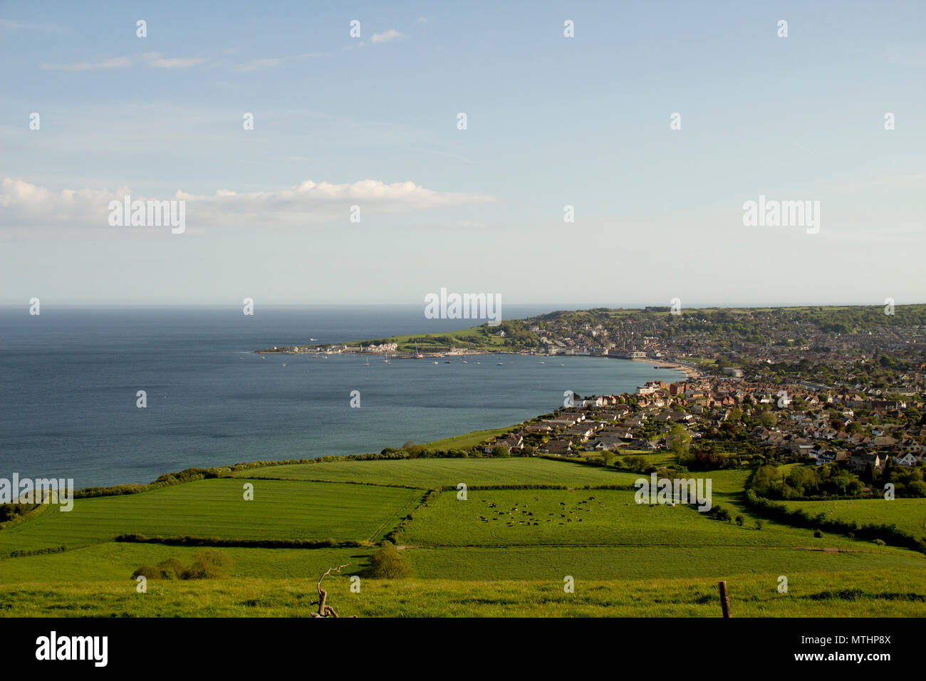 A beautiful view of the town of Swanage from atop a hill close to the ...