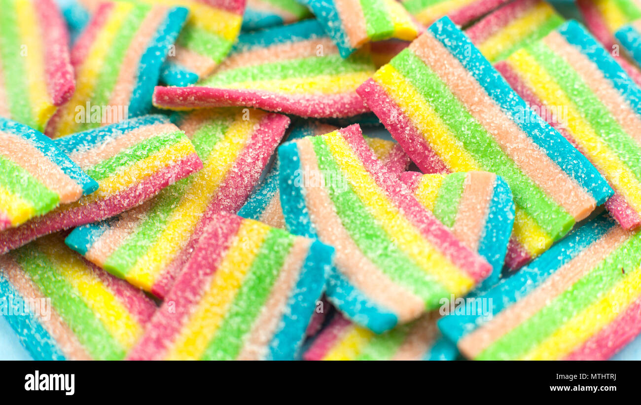 candies with jelly and sugar. colorful array of different childs sweets ...