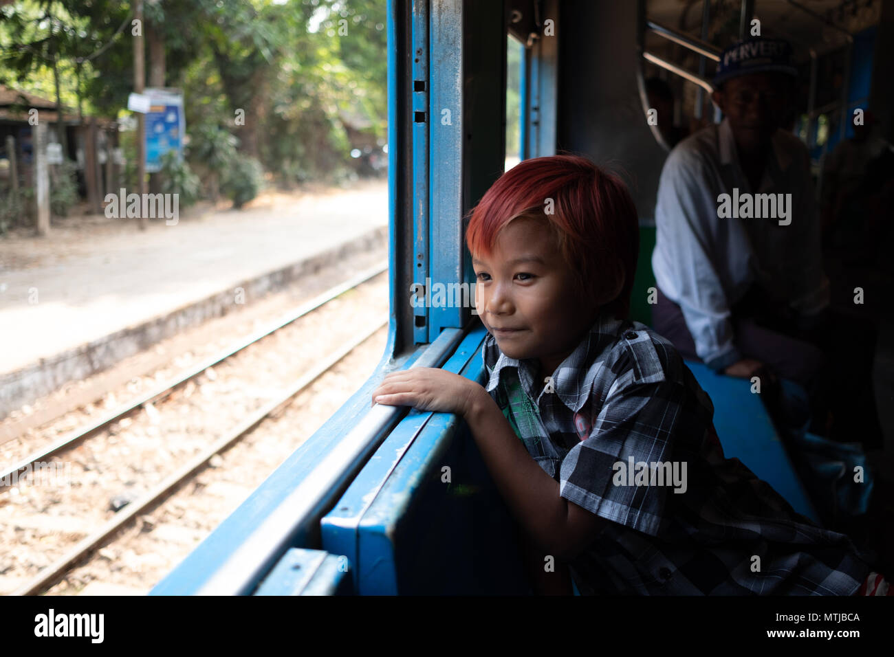 Passengers on board the Circular Train that loops round the City of ...