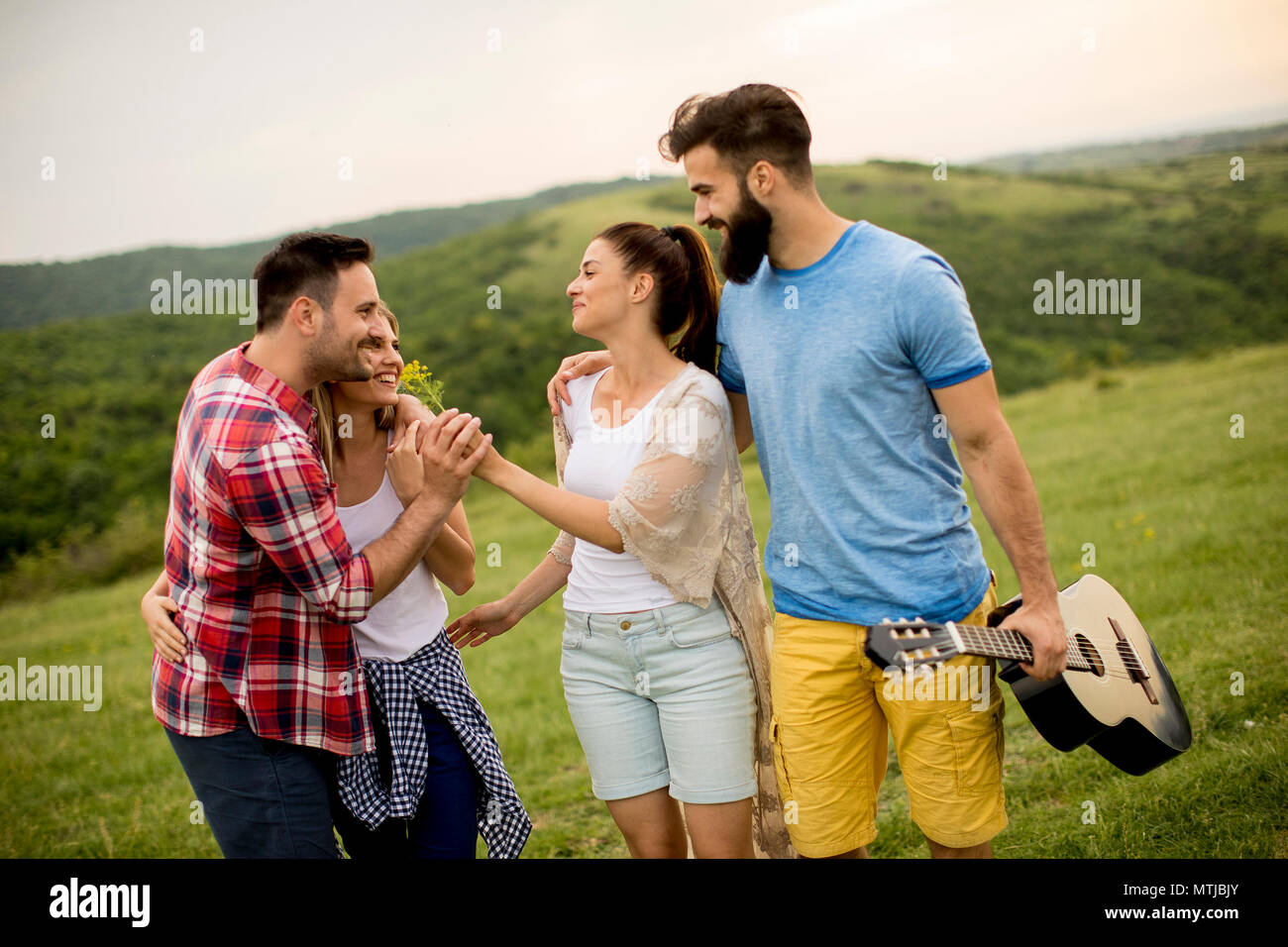 Group od young people having fun on a trip in nature on mountain Stock ...