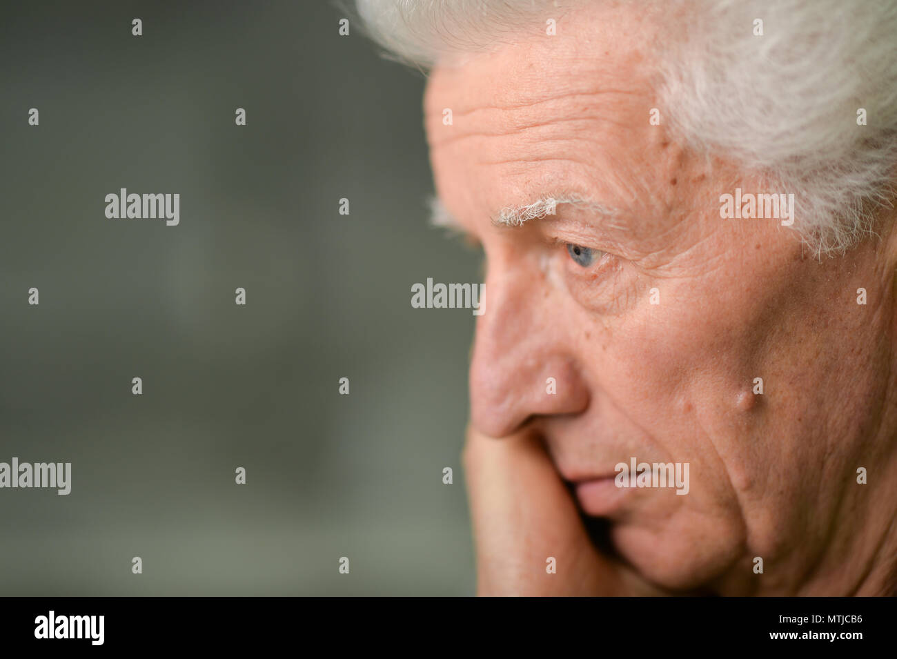 Portrait of sad senior man Stock Photo - Alamy
