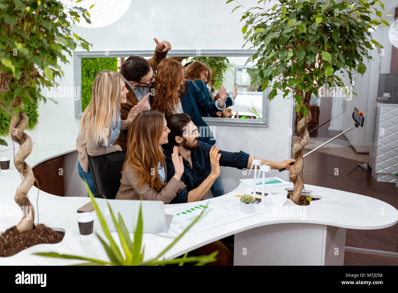 The successful business team celebrating developing their business and ...