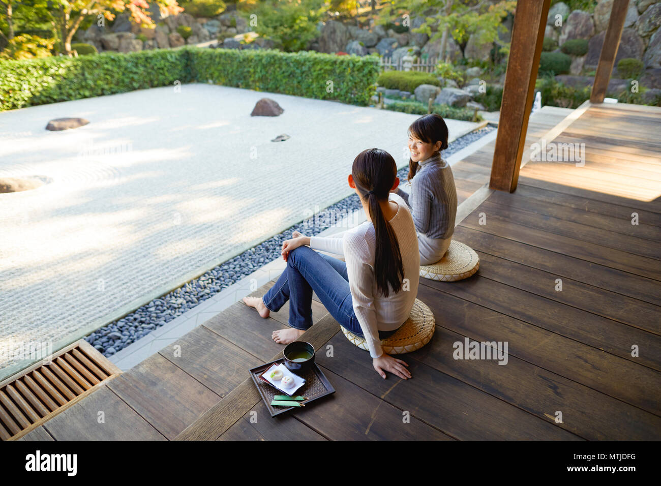 Japanese women in a temple Stock Photo - Alamy