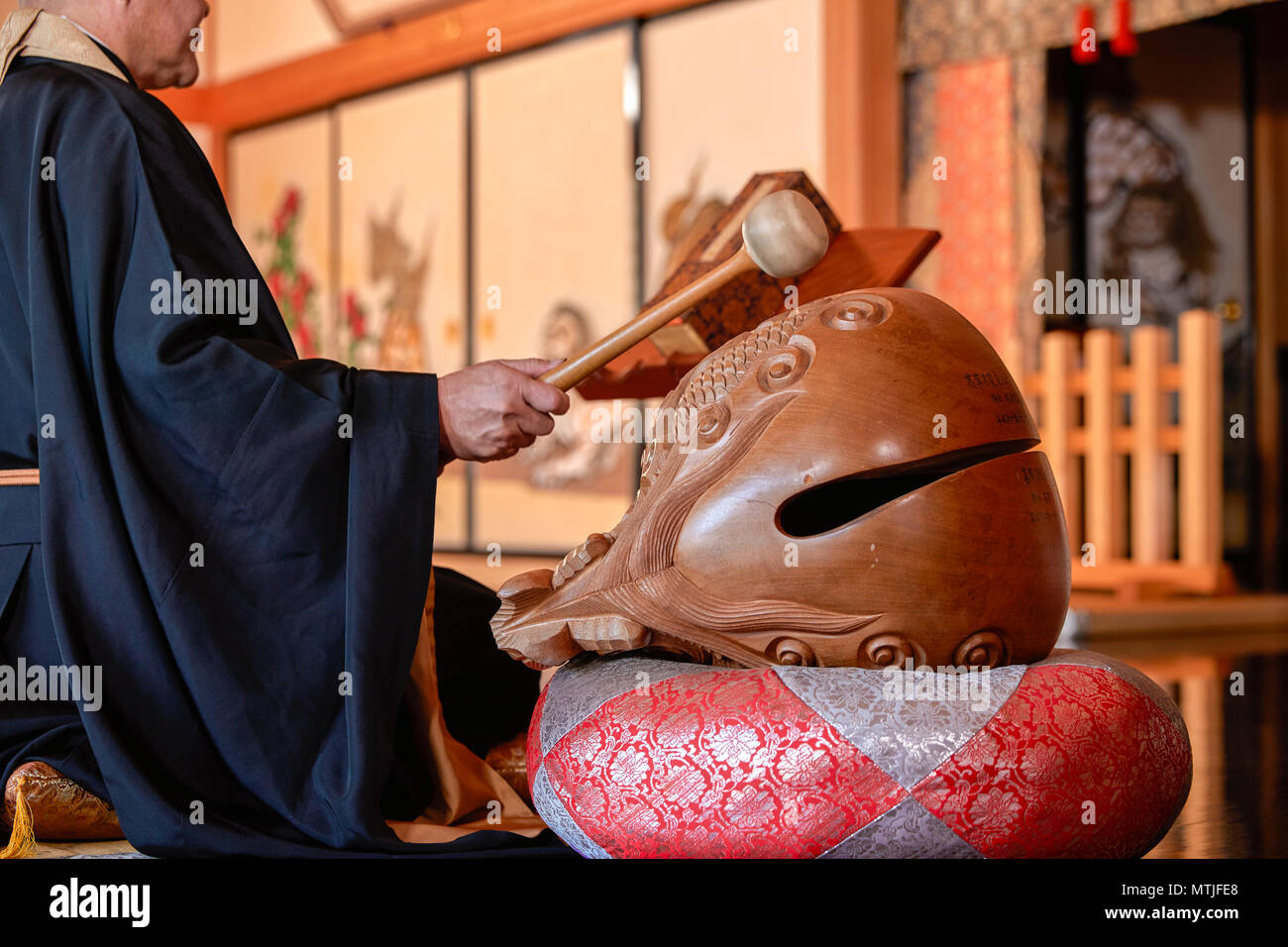 Japanese priest at a temple Stock Photo - Alamy