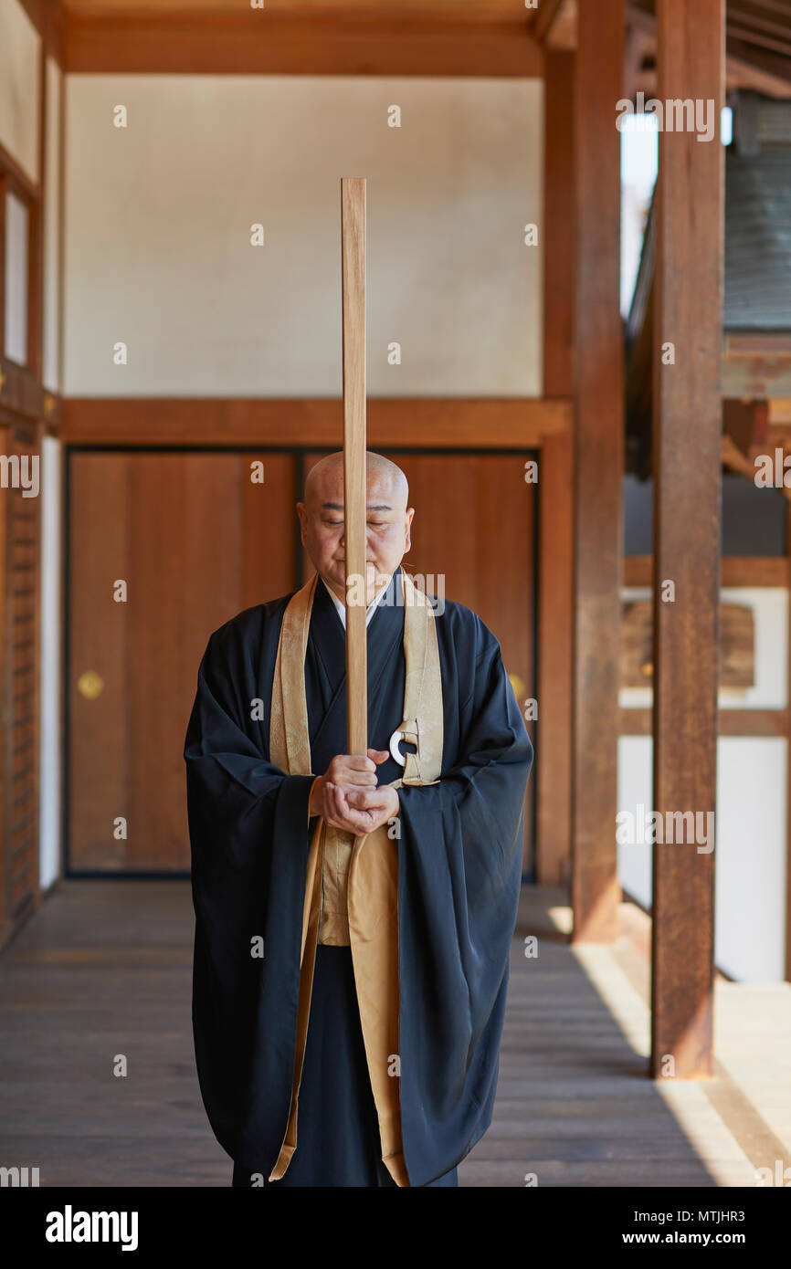 Japanese priest at a temple Stock Photo - Alamy