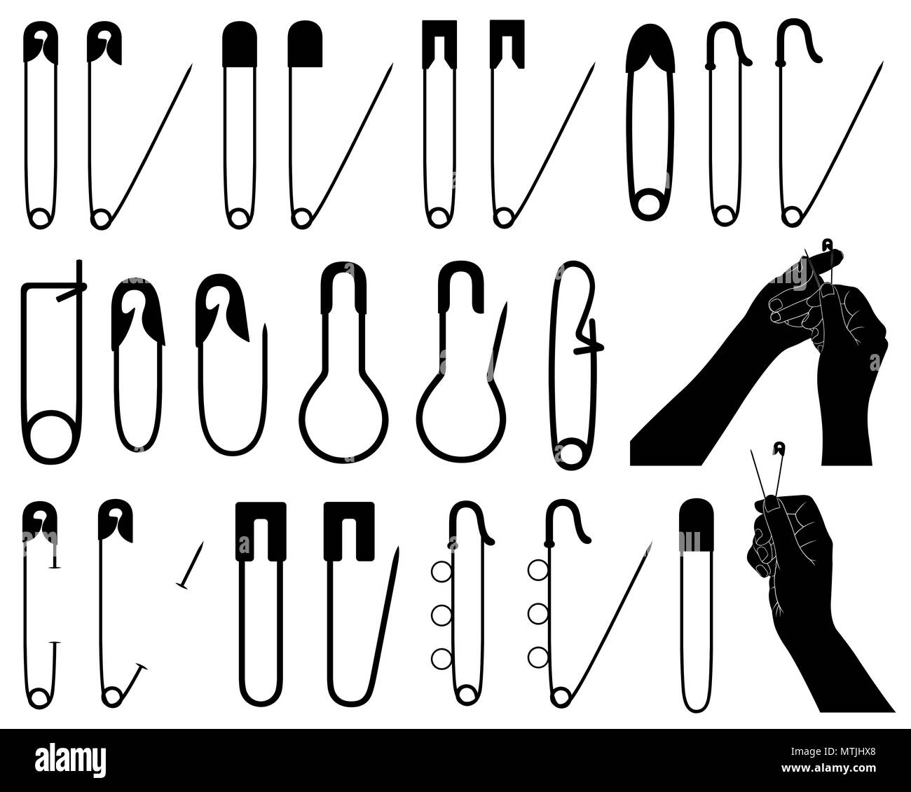 Set of different safety pins isolated on white Stock Photo - Alamy