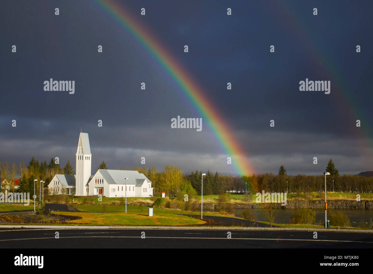 Heimilisfang: Kirkjuvegur, Iceland. 21st May, 2018. Rainbow, Sunshine ...