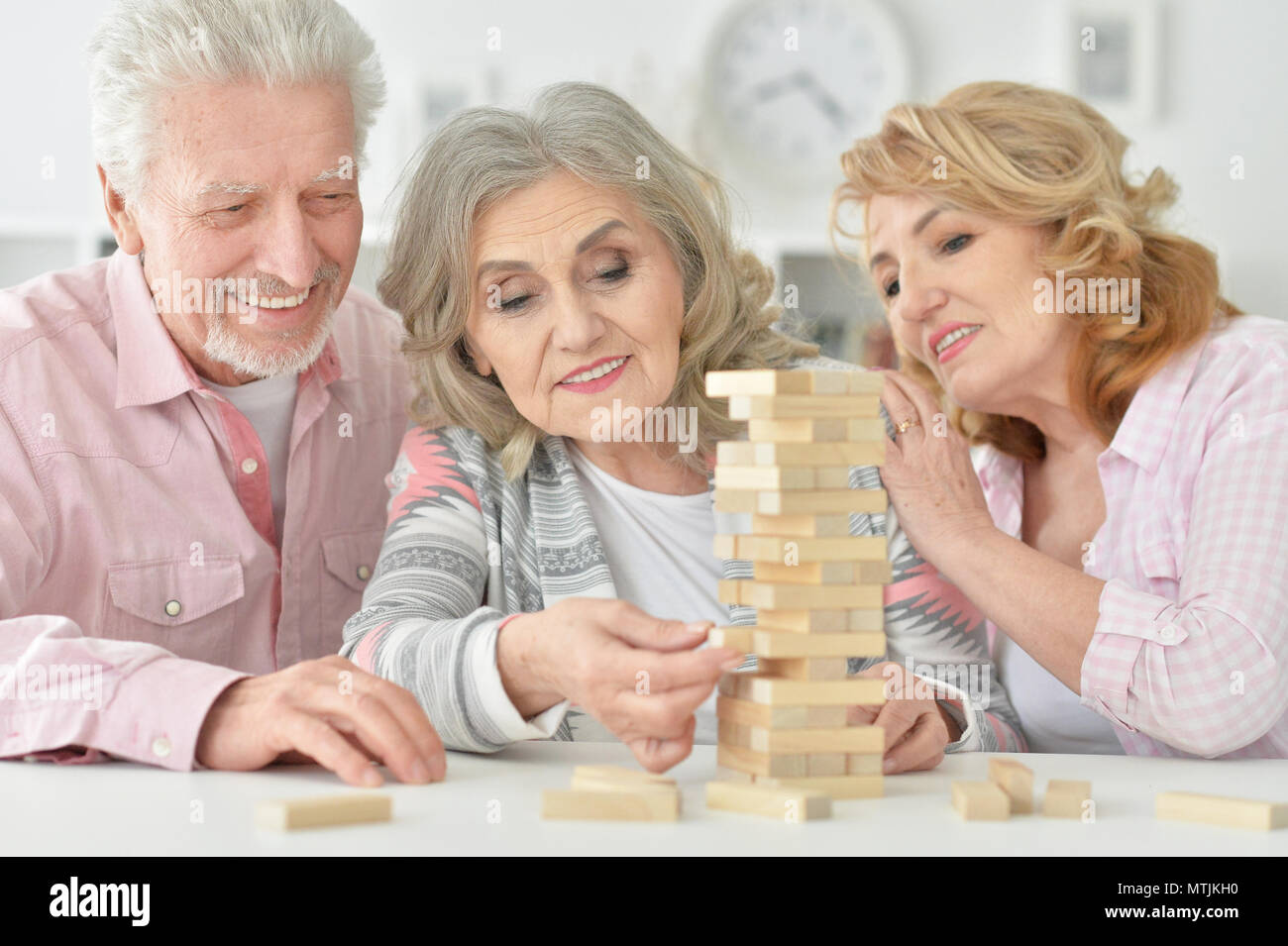 senior people playing with wooden blocks Stock Photo - Alamy
