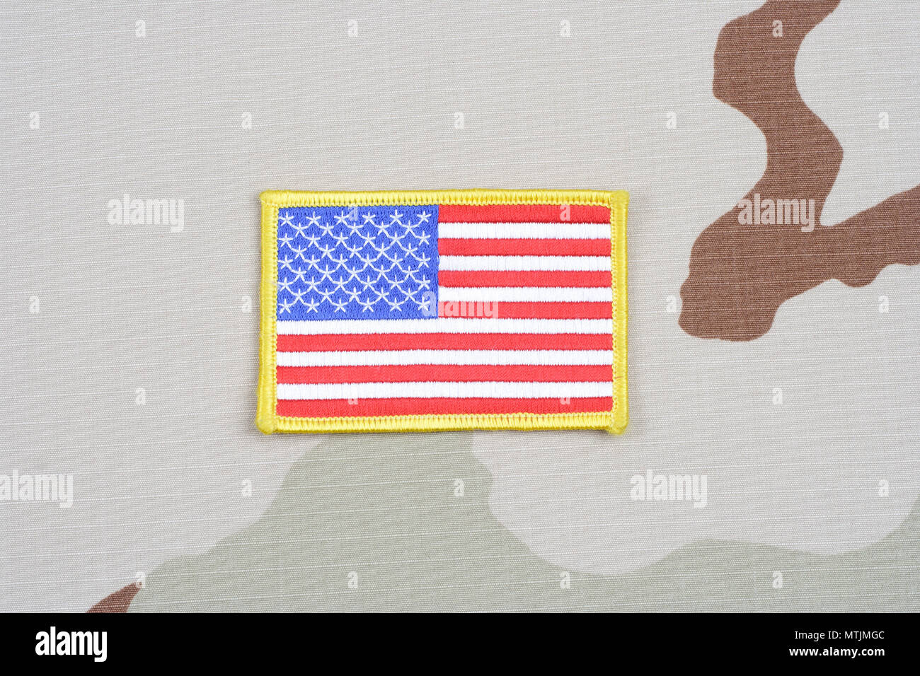 USA flag patch on desert camouflage uniform Stock Photo - Alamy