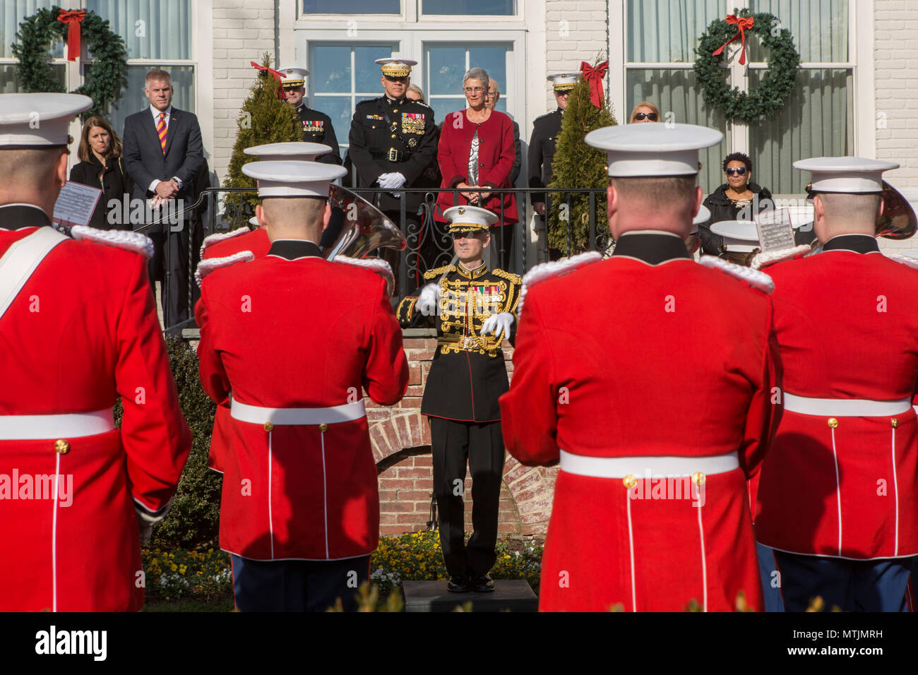U.S. Marine Corps Lt. Col. Jason K. Fettig, center, director of the U.S ...