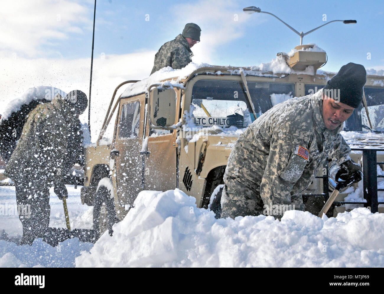 Soldiers from the 10th Mountain Division Sustainment Brigade work to ...