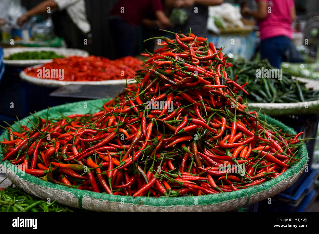 A stack of chili peppers in a market Stock Photo - Alamy