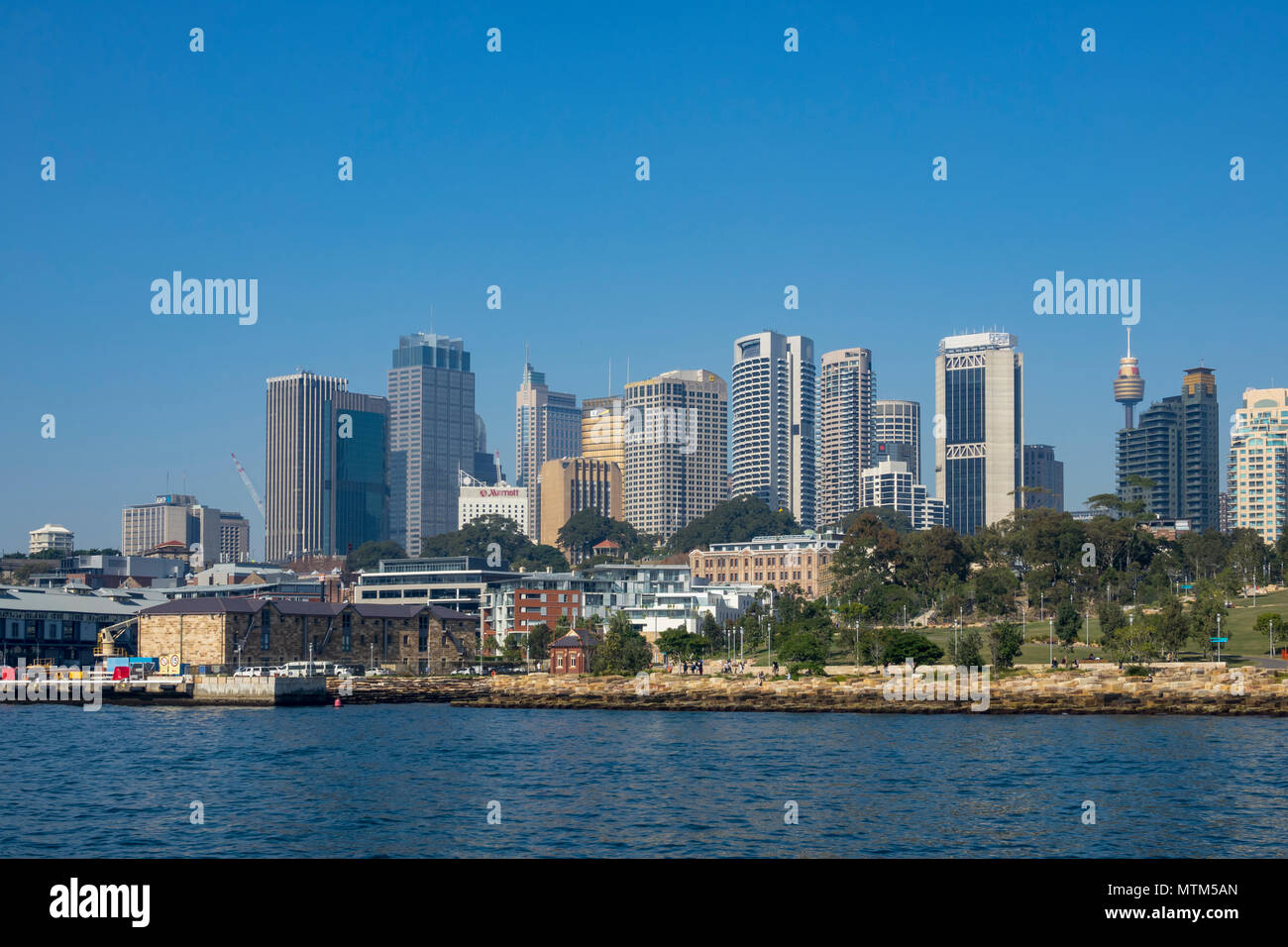 A sunny autumn day on Sydney Harbour, with views of the Sydney city ...