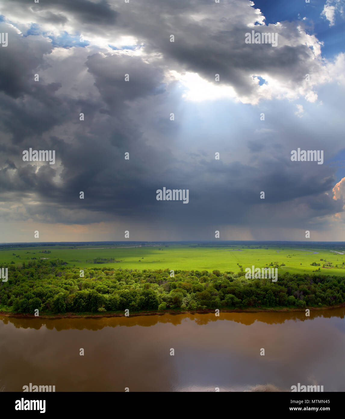 landscape with storm clouds and river Stock Photo - Alamy