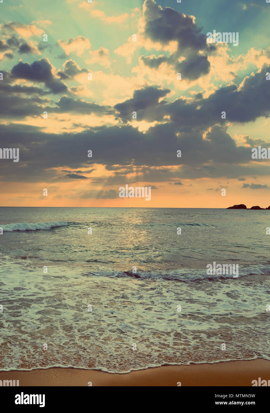 tropical sea sunset - vintage retro style Stock Photo - Alamy