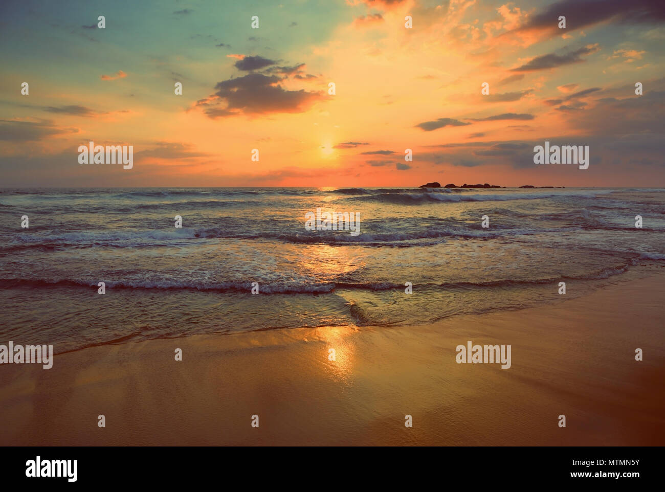 tropical sea sunset - vintage retro style Stock Photo - Alamy