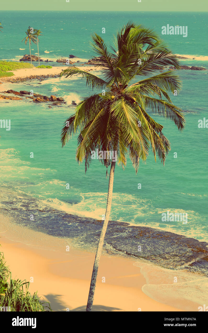 tropical beach - vintage retro style Stock Photo - Alamy