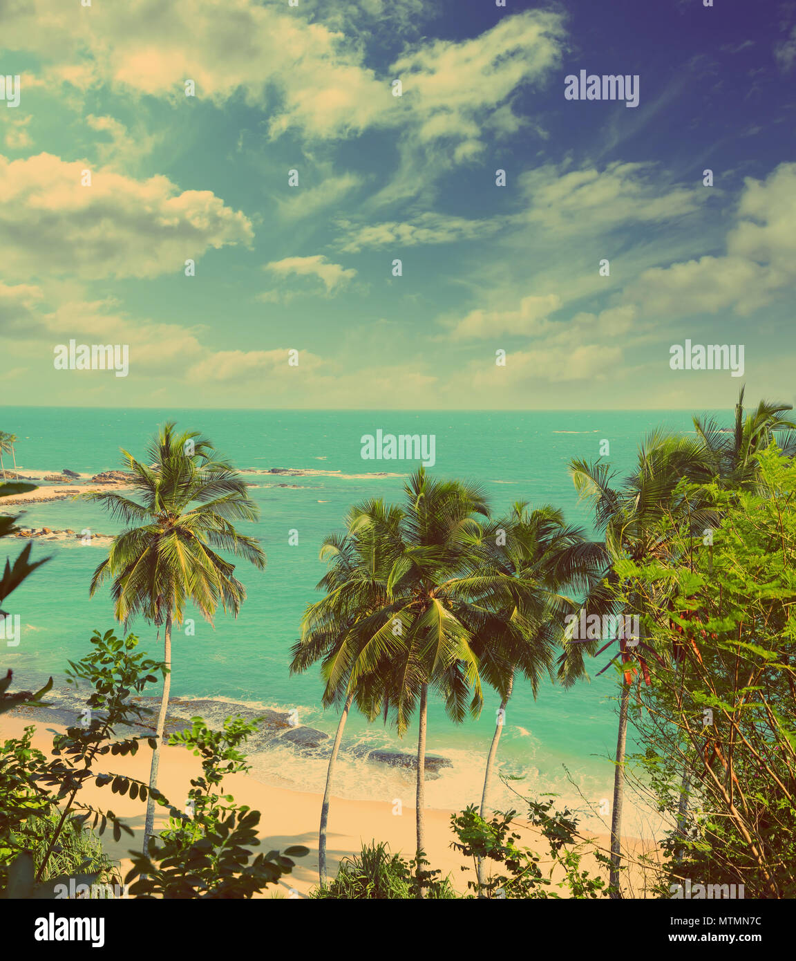 tropical beach landscape - vintage retro style Stock Photo - Alamy
