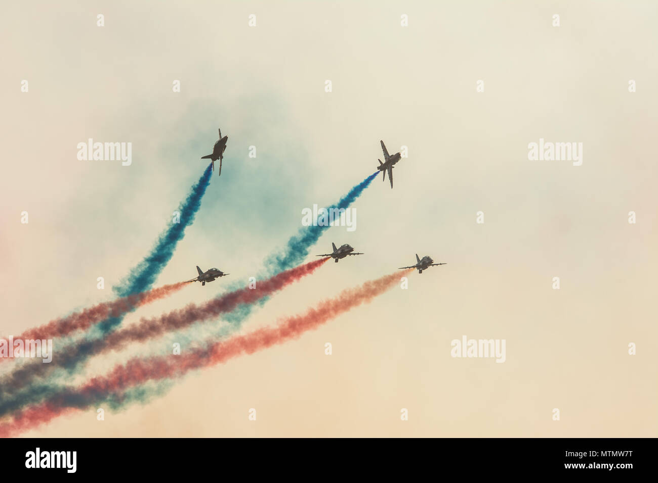 Airplanes doing stunts at an airshow Stock Photo - Alamy