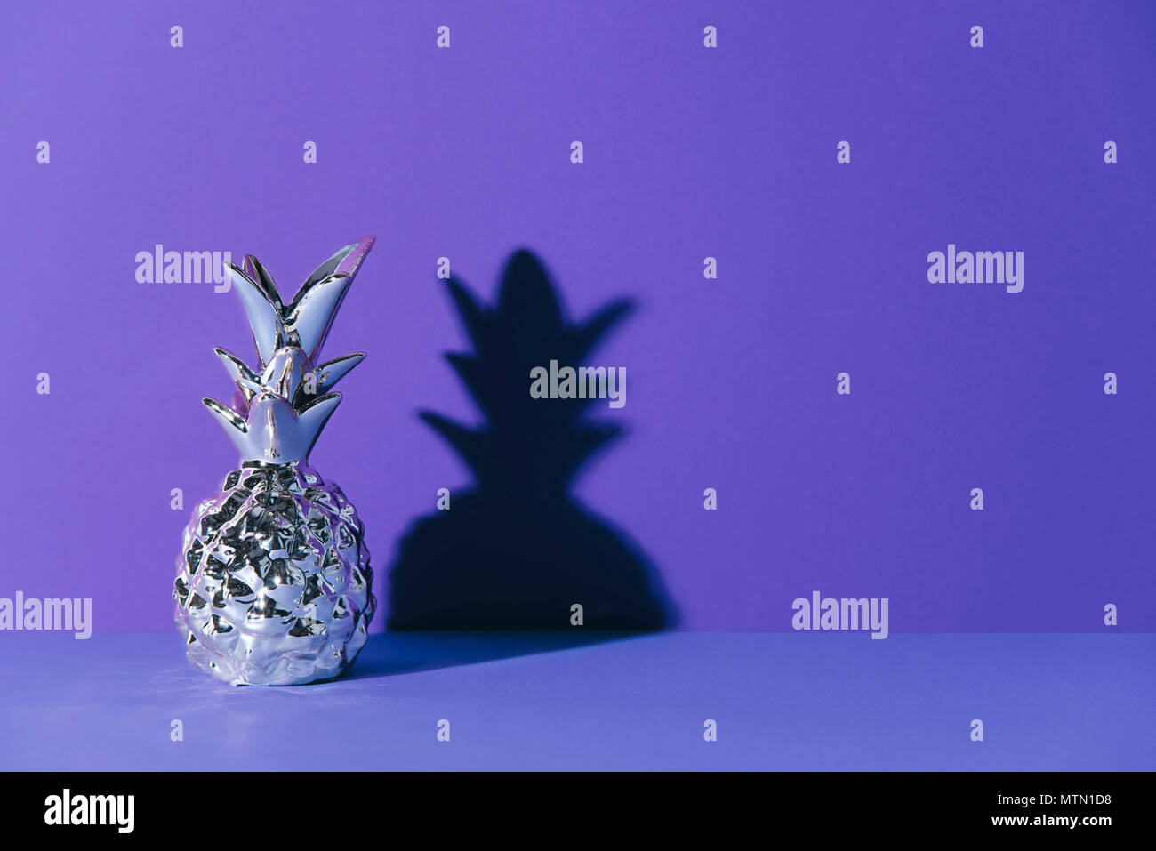 Tropical golden Pineapple on ultraviolet background. Minimal concept ...