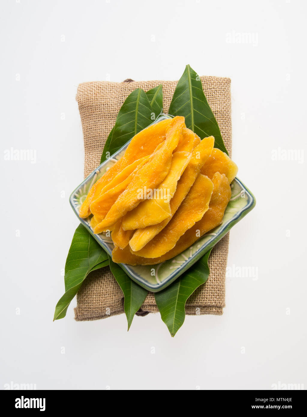 Dried Mango or Dried Mango slices on a background Stock Photo - Alamy