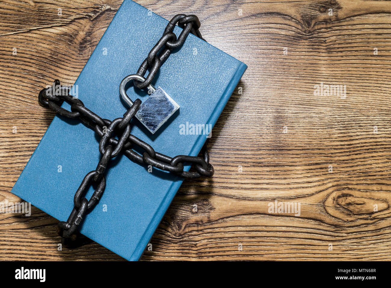 Information security concept, book with chain and padlock Stock Photo ...