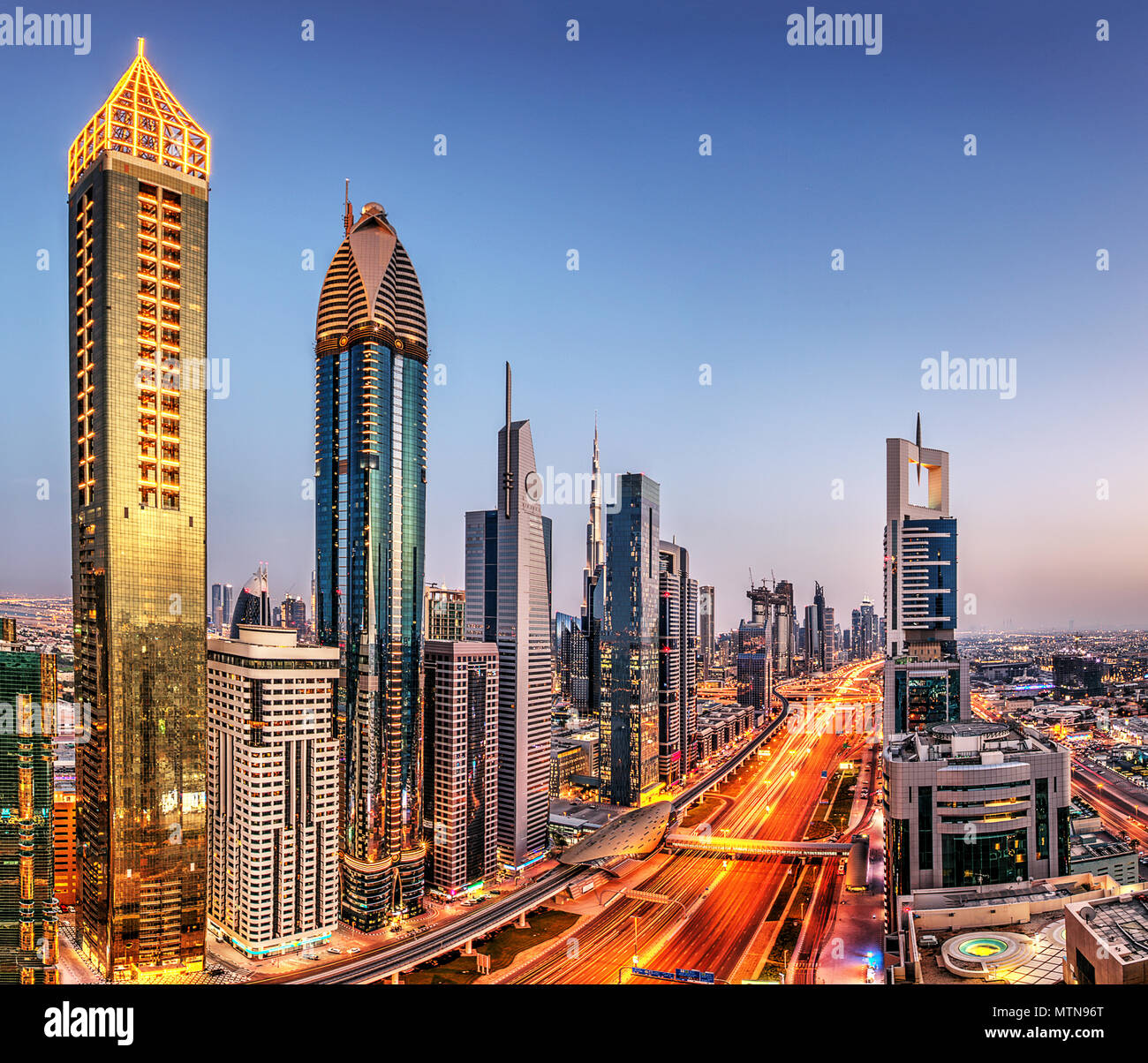 Dubai sunset panoramic view of Burj Khalifa with Sheike Zayed road ...