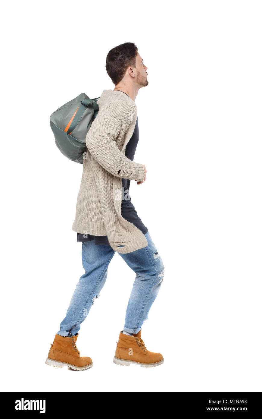 Side view of a running man with a green bag. Side view people ...