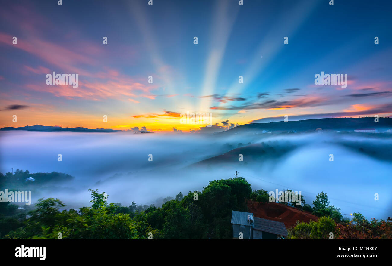 Dawn on plateau in morning with colorful sky, while sun rising from ...