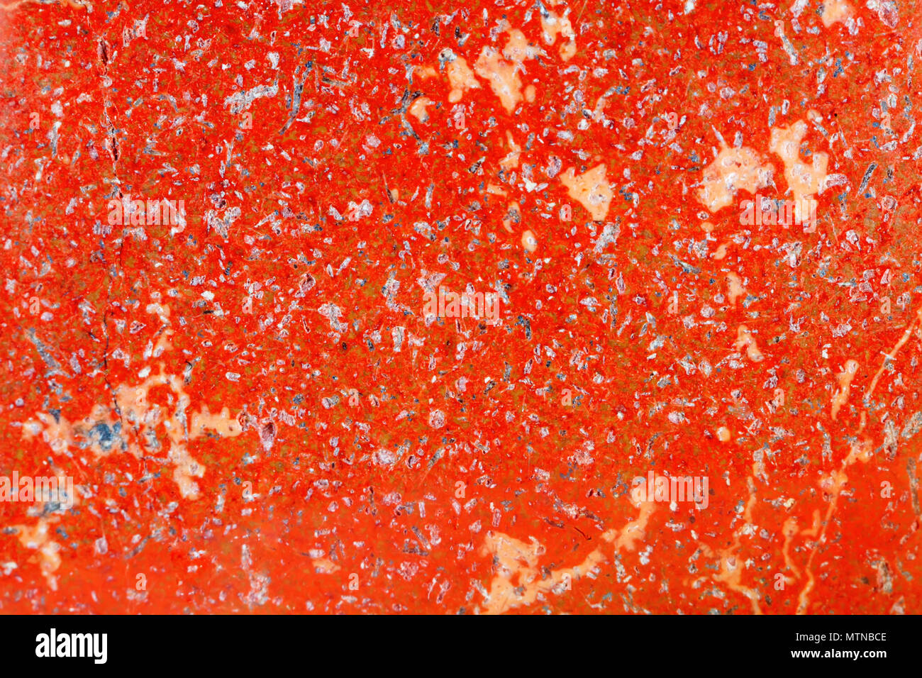 Mineral red jasper. The texture of the mineral. Macro shooting of ...