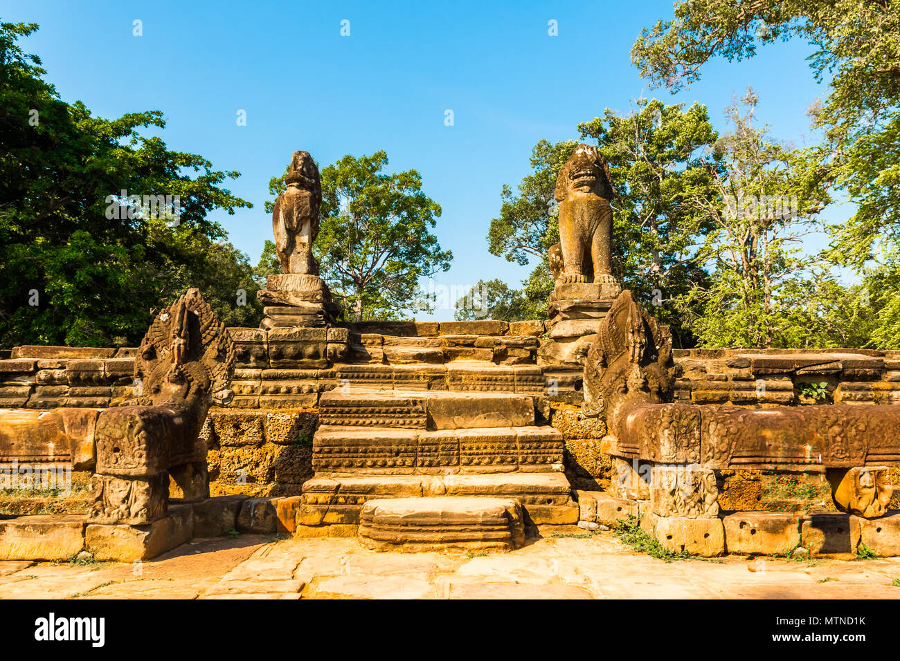 Srah Srang with Lion and Naga statues in Angkor, Cambodia Stock Photo ...