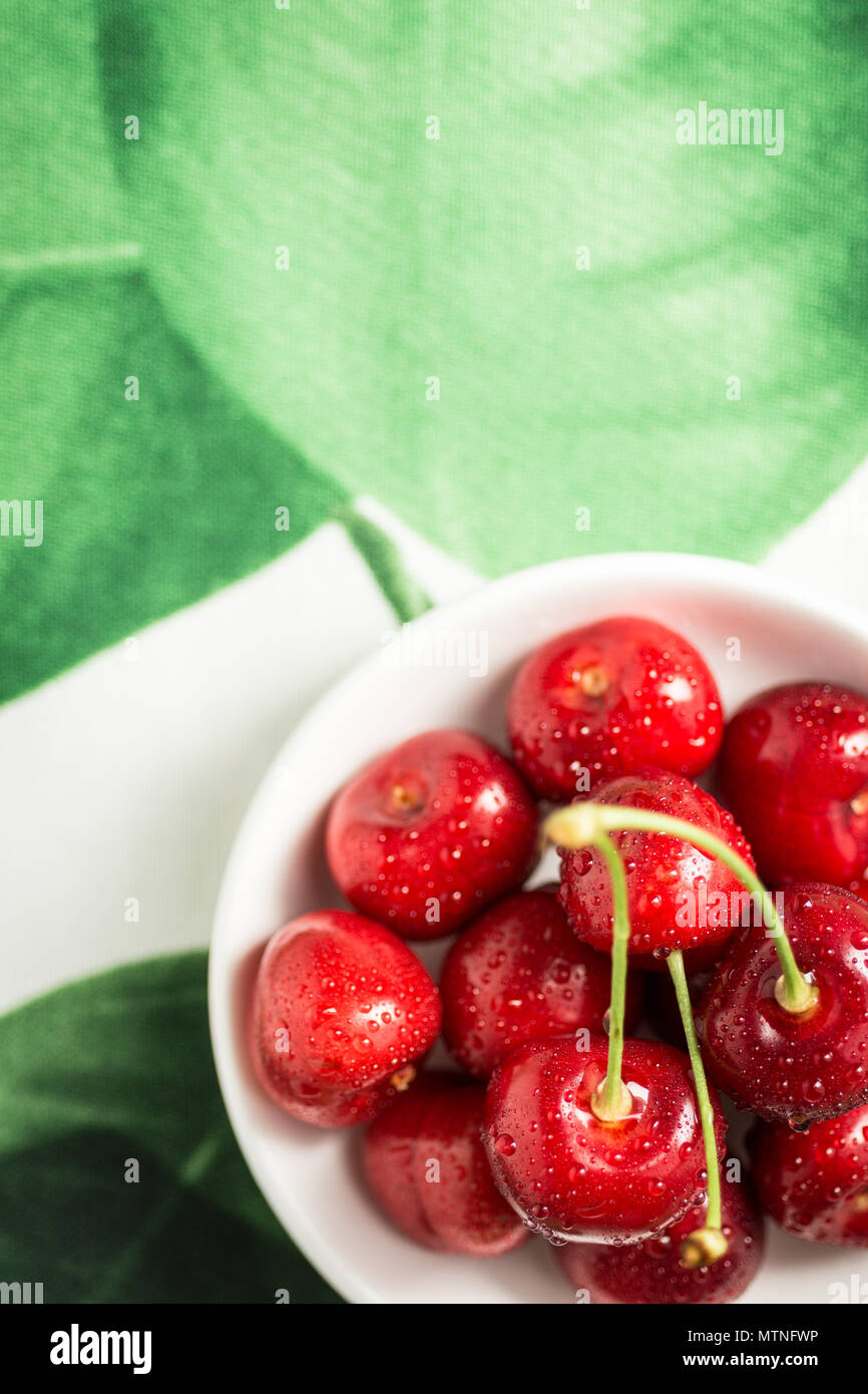 Fresh Ripe Cherries in White Bowl with Copy Space. Summer and Harvest ...