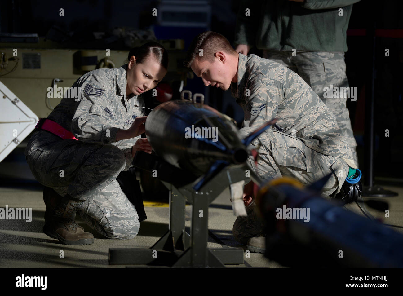 U.S. Air Force Staff Sgt. Sarah Gonzales, left, 52nd Aircraft ...