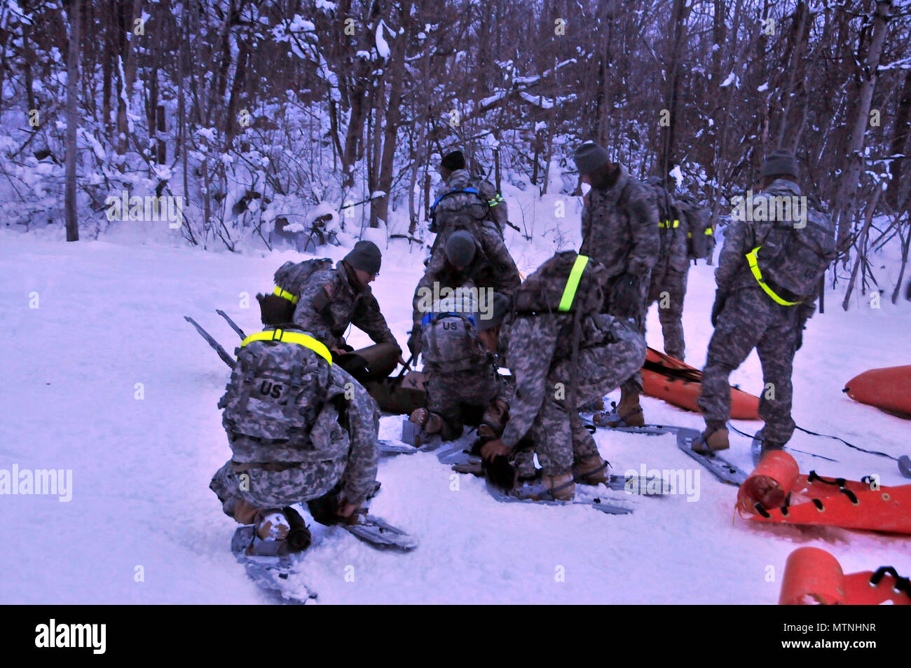 Soldiers from the 10th Mountain Division prepare litters during a ...