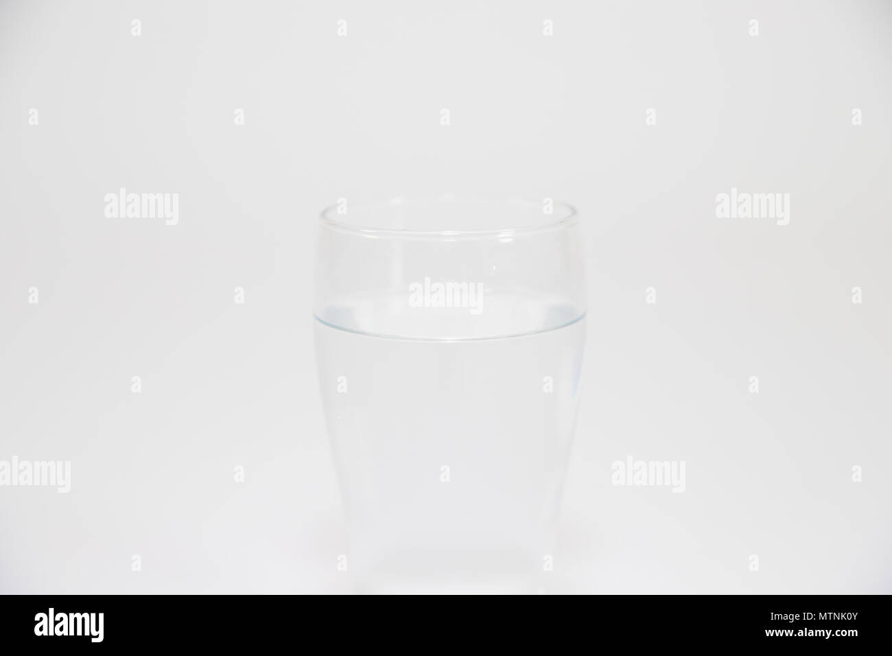 Water glass isolated on white Stock Photo - Alamy
