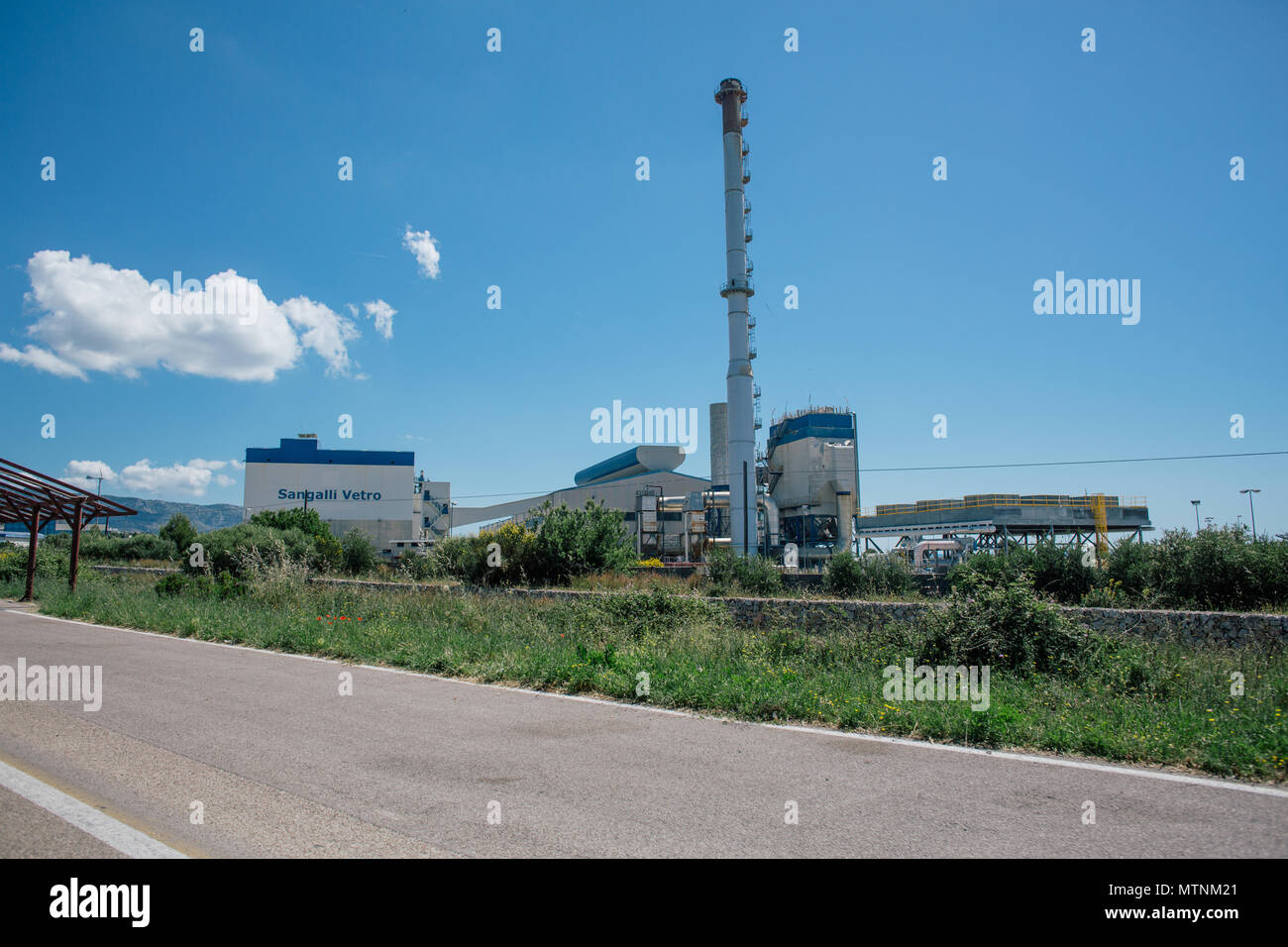 Factory near the road in Italy Stock Photo - Alamy