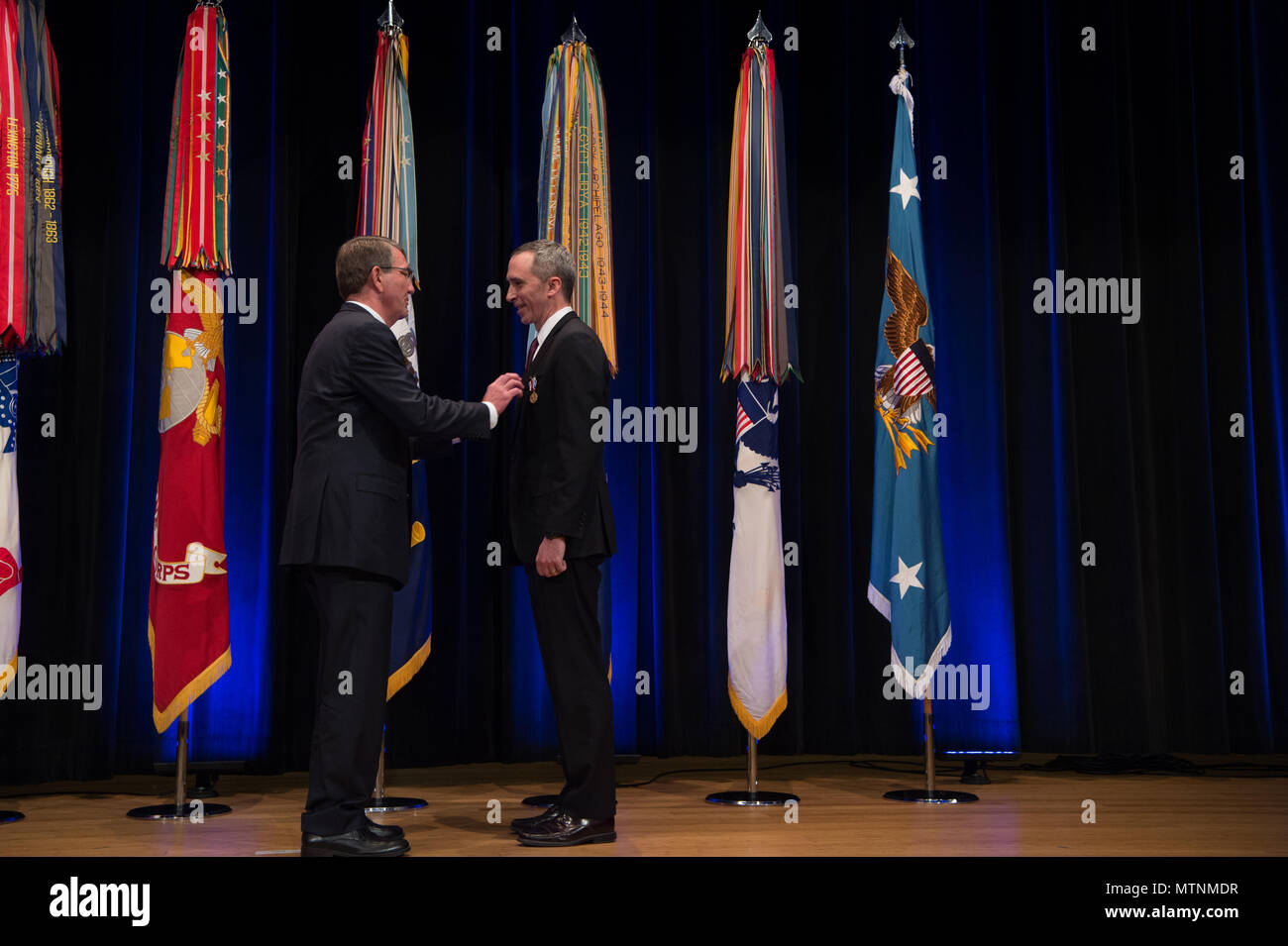 Defense Secretary Ash Carter recognizes the Under Secretary of Defense ...