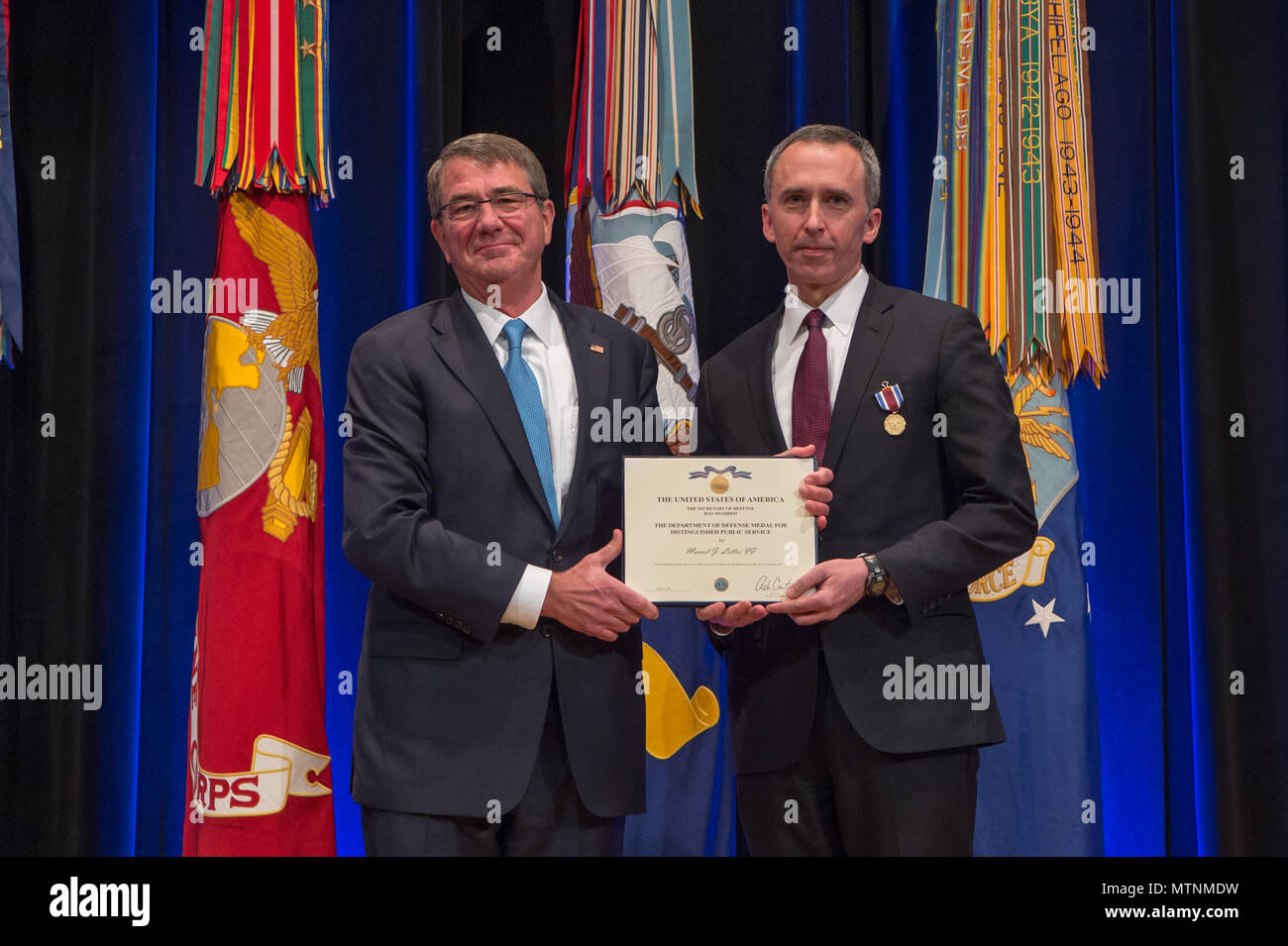 Defense Secretary Ash Carter recognizes the Under Secretary of Defense ...