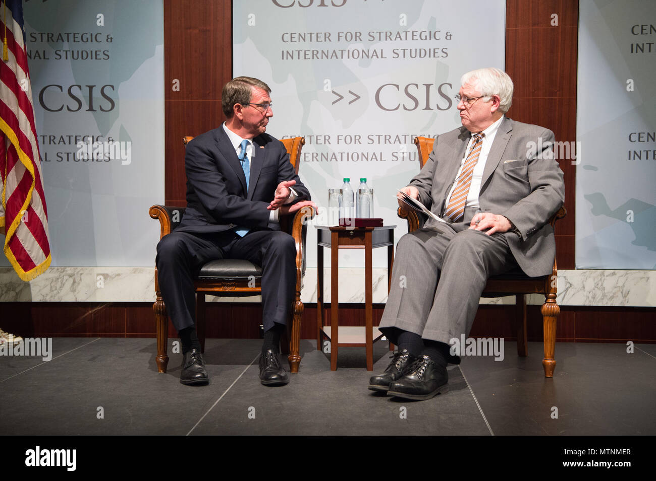 Defense Secretary Ash Carter speaks with President and CEO of the ...