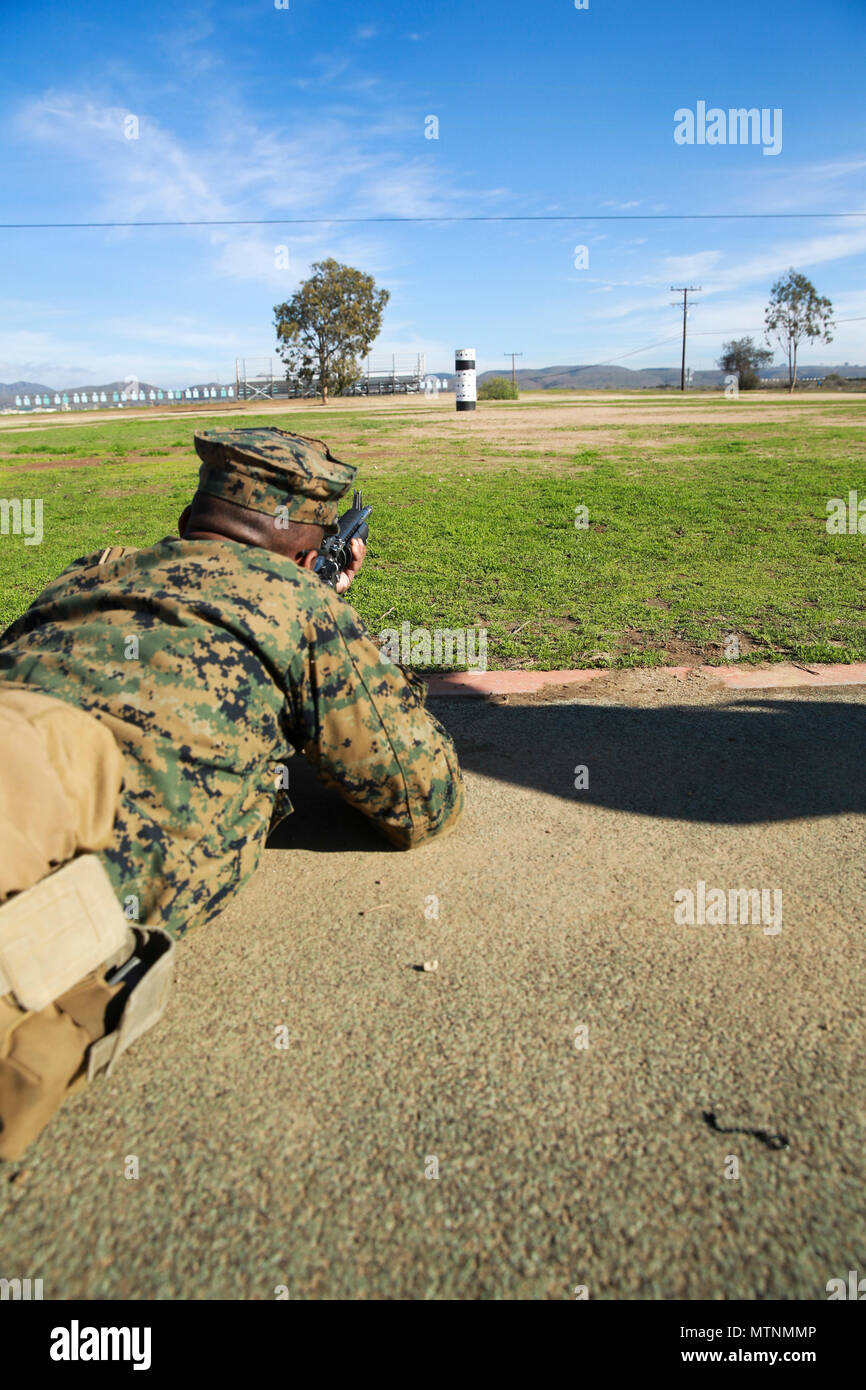 A recruit from India Company, 3rd Recruit Training Battalion, aims at a ...