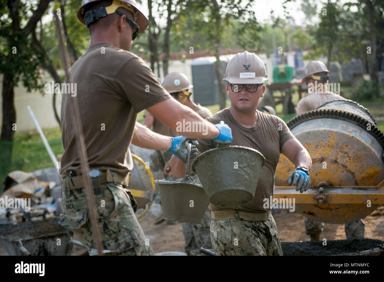 Builder Constructionman Glenn Vaca, left, and Builder 2nd Class Jaime ...