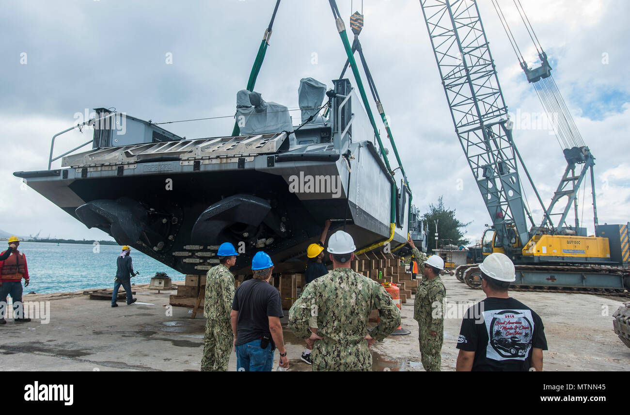 Sailors assigned to Coastal Riverine Group (CRG) 1 Det Guam oversee the ...