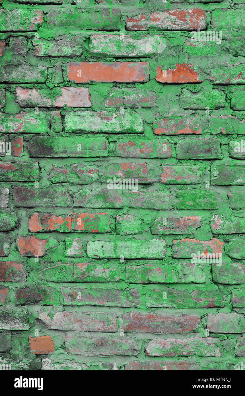 Weathered stained old brick wall background. Texture of an old green ...