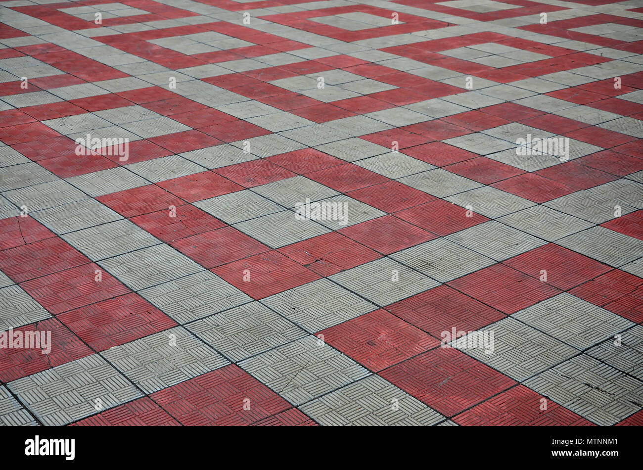 Photo of the site from the old paving slab with small defects and ...