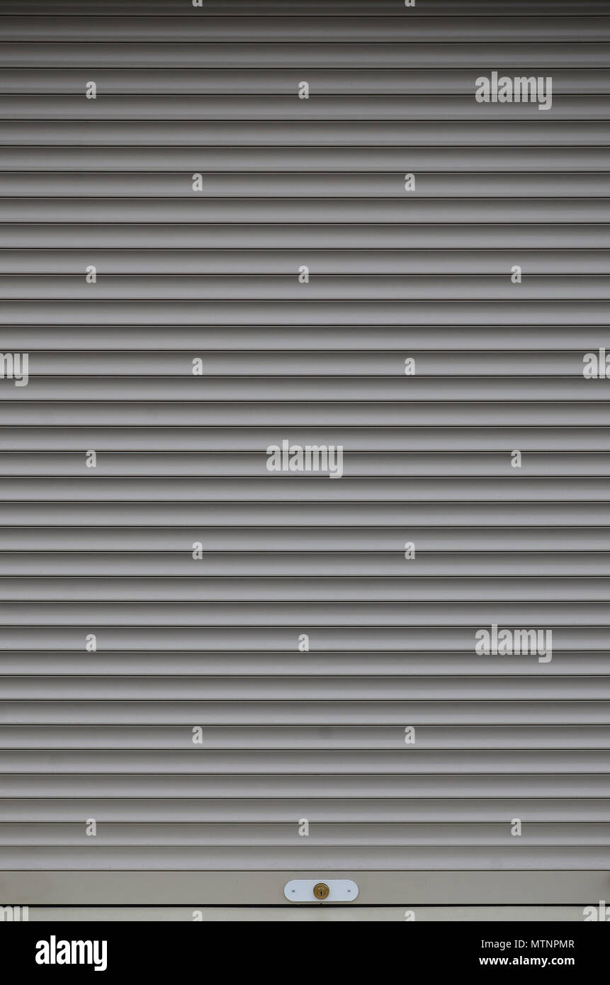 The texture of corrugated metal sheet, white or grey slide door. Old ...