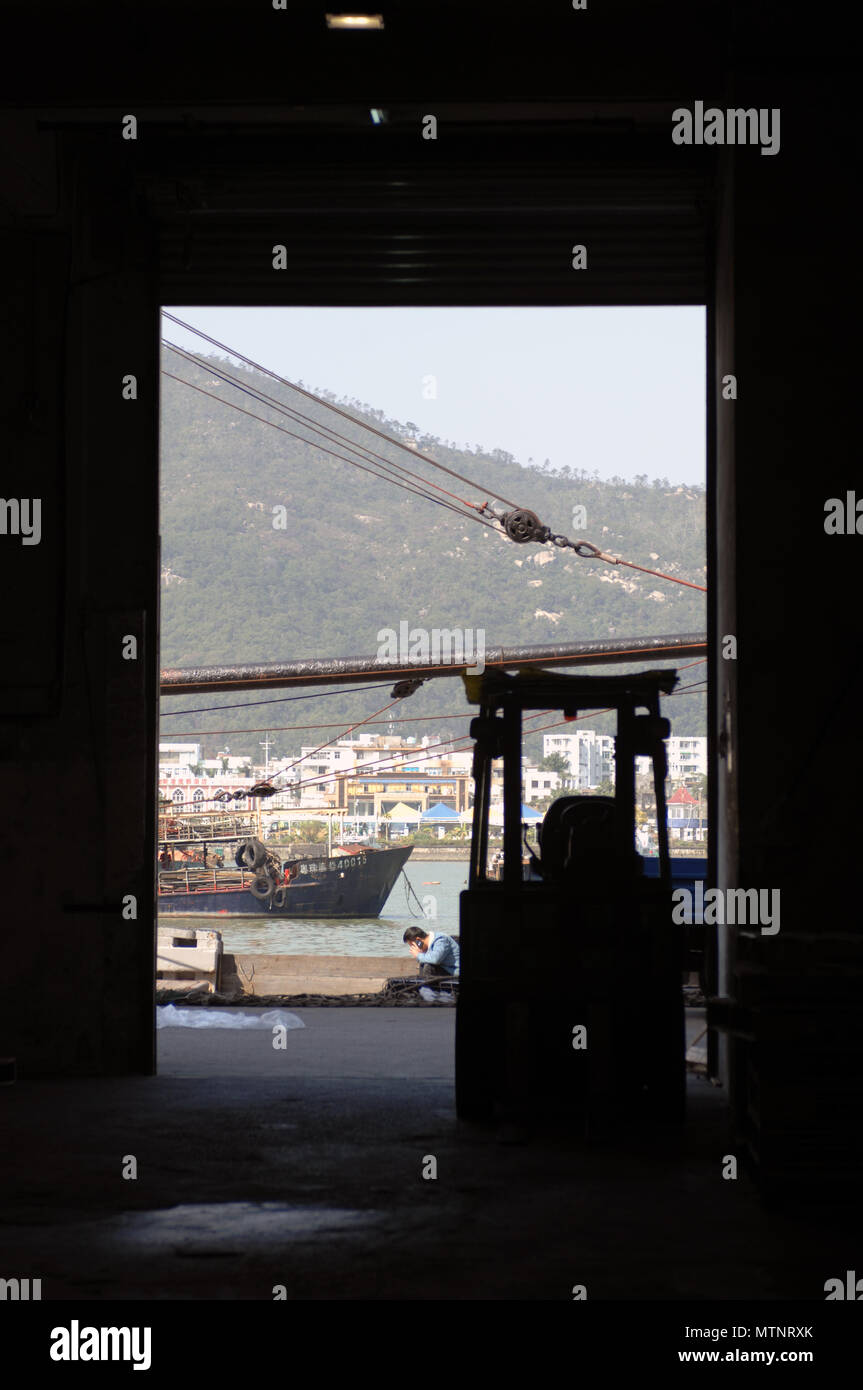 View through arch of fishing port, Macau, China Stock Photo - Alamy