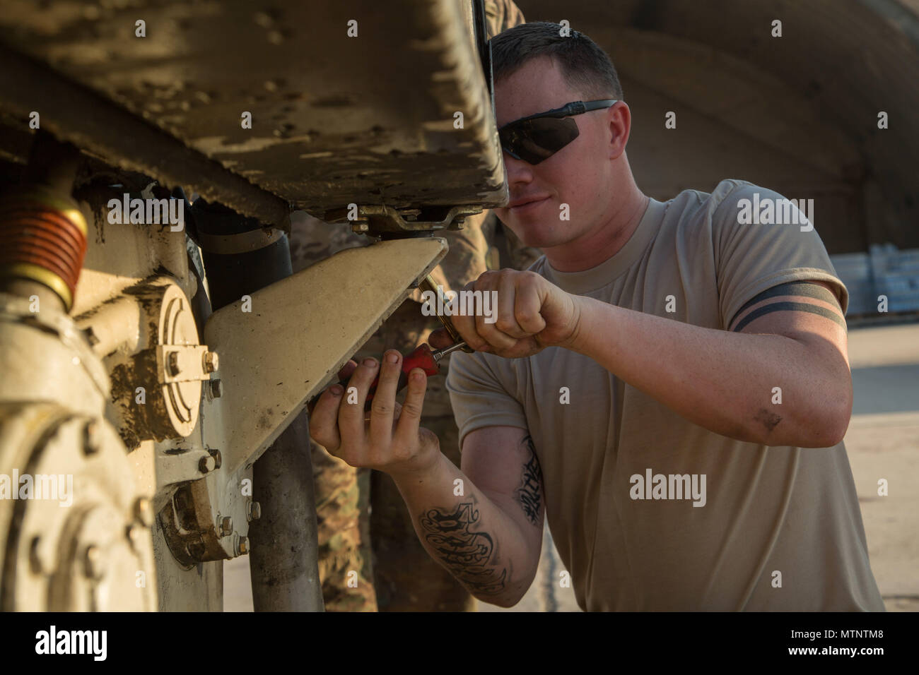 U.S. Army Pfc. Reilly Tilley, an artillery mechanic assigned to B ...