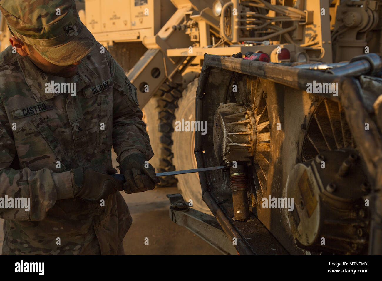 U.S. Army Cpl. Adrian Castro, an artillery mechanic assigned to B ...
