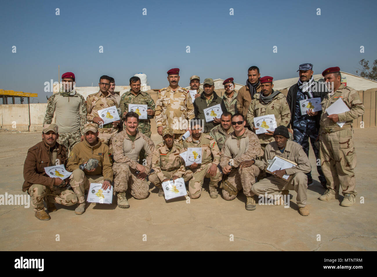 U.S. Navy corpsmen assigned to Team 40, Task Force Al-Taqaddum and ...